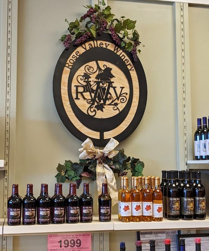 Rose Valley Winery's elegant display offers a taste of Michigan's growing wine culture between shopping sprees. Retail therapy pairs nicely with a glass of local red.
