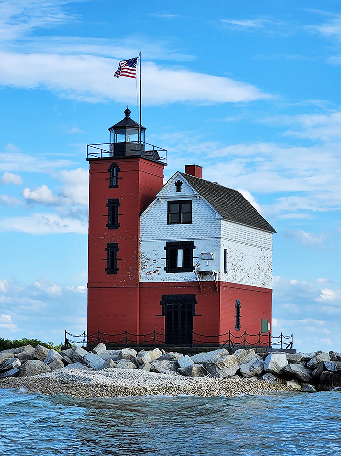 Standing sentinel in the Straits of Mackinac, Round Island Lighthouse has guided vessels through these waters since the late 19th century.