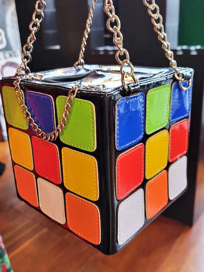 Someone turned a Rubik's Cube into a purse, and frankly, it's exactly the kind of genius this world needs more of.
