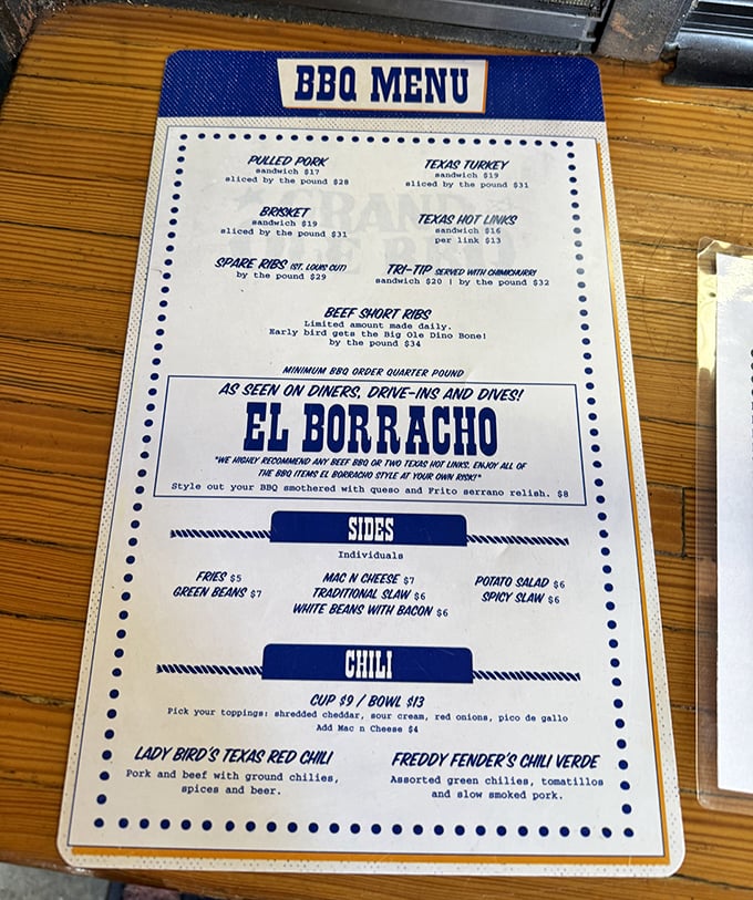 The menu of dreams – where decisions become deliciously difficult. Each option promises a different path to barbecue enlightenment, with El Borracho beckoning the truly adventurous.