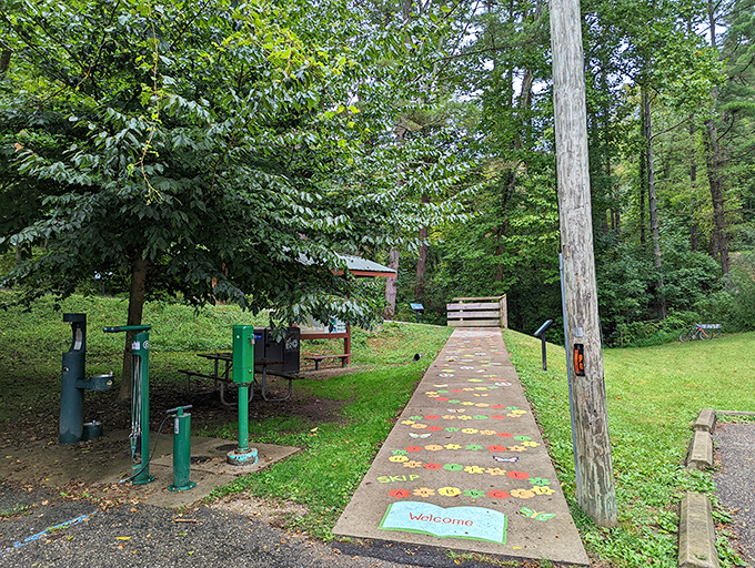 Nature meets whimsy on this colorful welcome path, where even the concrete gets dressed up for visitors exploring Athens' hidden green spaces.