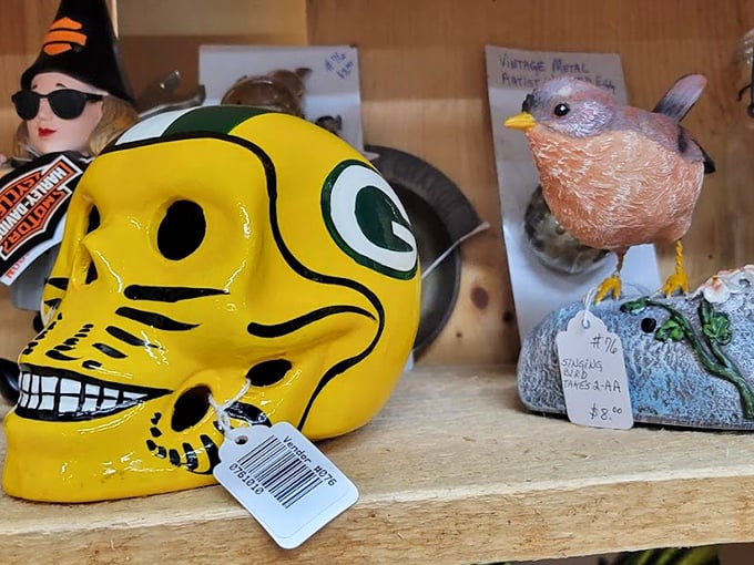 The Packers skull grins with team spirit while a vintage witch and colorful bird stand guard over your potential purchases.