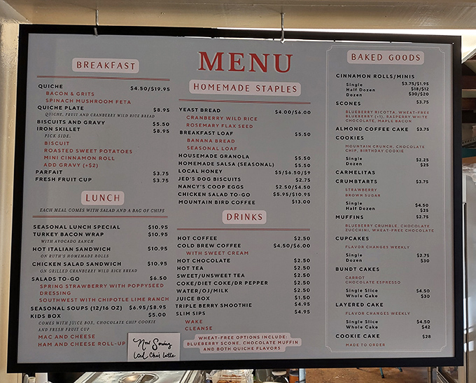 The menu board stands as a delicious roadmap to happiness, with breakfast, lunch, and baked goods competing for your undivided attention.
