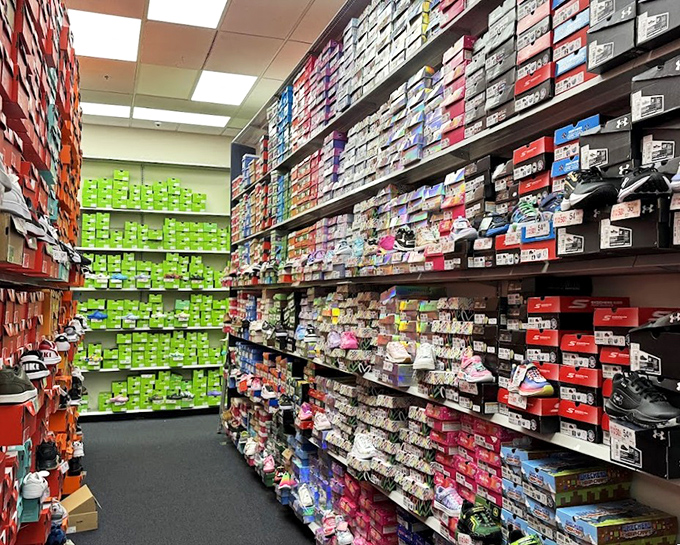 The Nike outlet's shoe section stretches to infinity, offering more athletic footwear options than there are Florida retirees with tennis rackets.