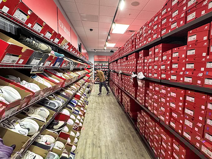 The wall of red boxes at New Balance isn't just shoe storage&mdash;it's a monument to the human desire for comfortable feet and wallet-friendly prices.