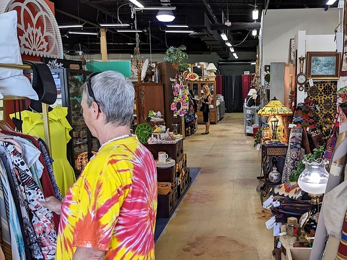 Where shoppers become time travelers, browsing decades past in vibrant Hawaiian shirts that could tell stories of their own.