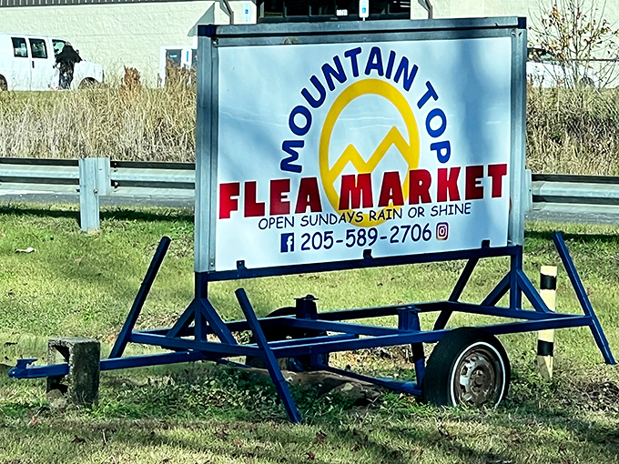 That roadside sign promises rain-or-shine dedication&mdash;because true bargain hunters never let weather dampen their spirits.