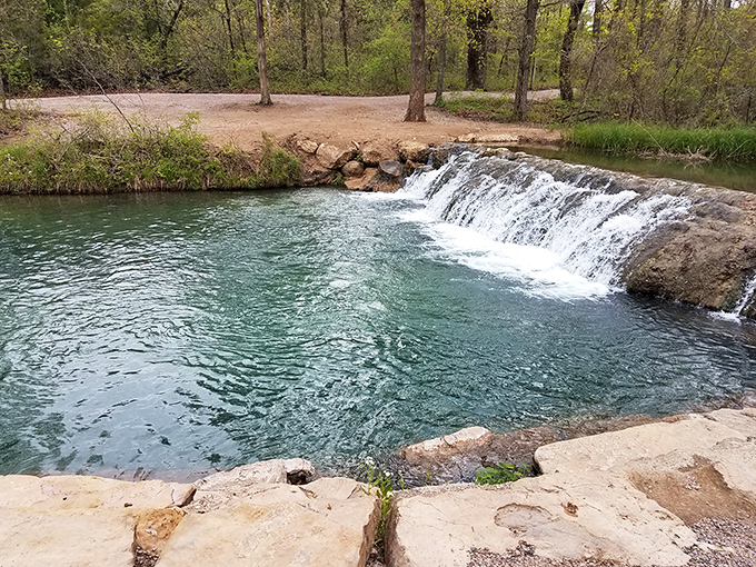 Mother Nature's perfect spa day: crystal-clear waters tumbling over ancient limestone, creating nature's version of that expensive massage you've been putting off.