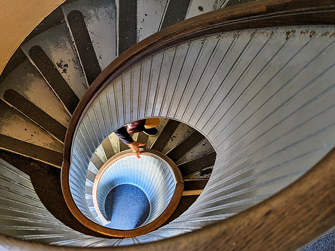 Looking down this hypnotic spiral staircase feels like peering through time itself. Those worn steps have stories to tell!