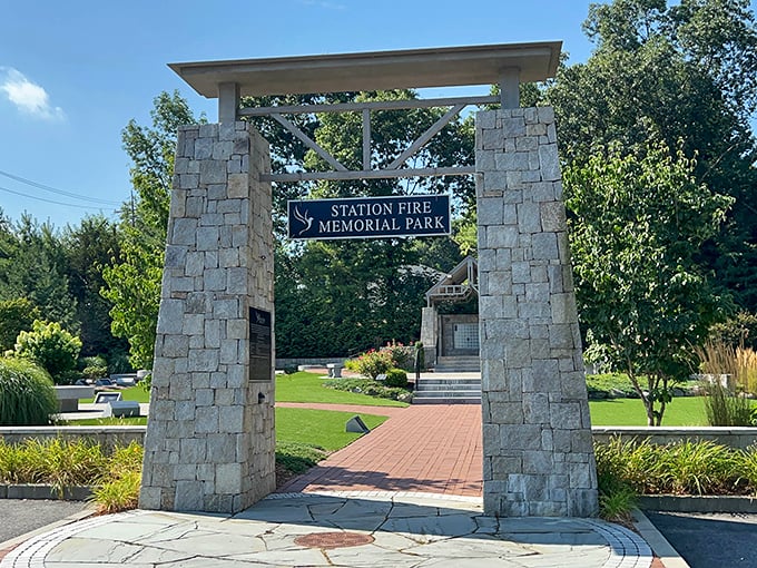 Station Fire Memorial Park stands as a solemn tribute, its stone archway inviting visitors to remember the past while embracing the community's resilient spirit.
