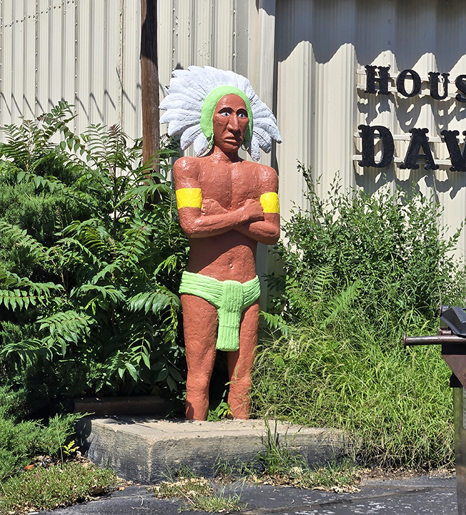 This colorful guardian watches over the site, dressed for a disco that ended decades ago.