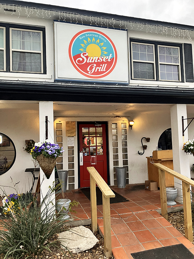 Sunset Grill's inviting entrance promises New American dishes with Texas flair. Those hanging flower baskets aren't just for show—they're a warm Hill Country hello.