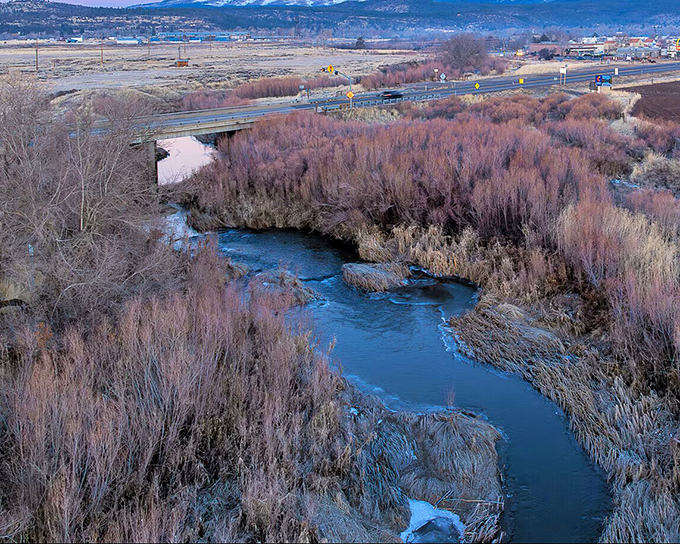 The Susan River winds through town like nature's own meditation app, offering tranquility you can't download from the App Store.