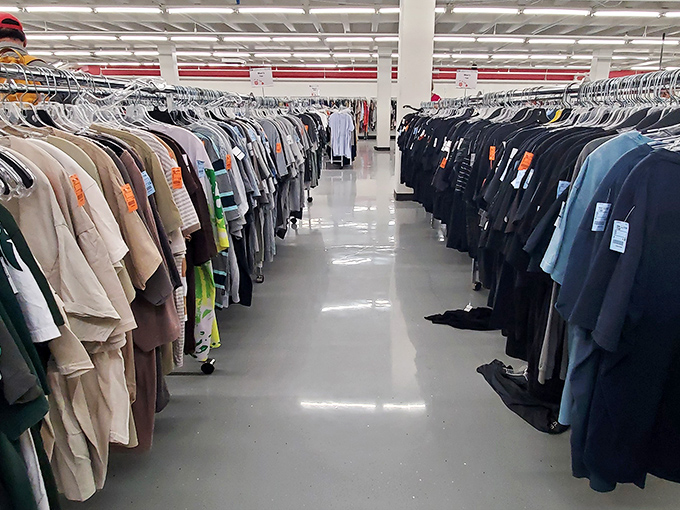 The men's clothing section stretches like an ocean of possibilities&mdash;Hawaiian shirts and business attire peacefully coexisting in bargain harmony.
