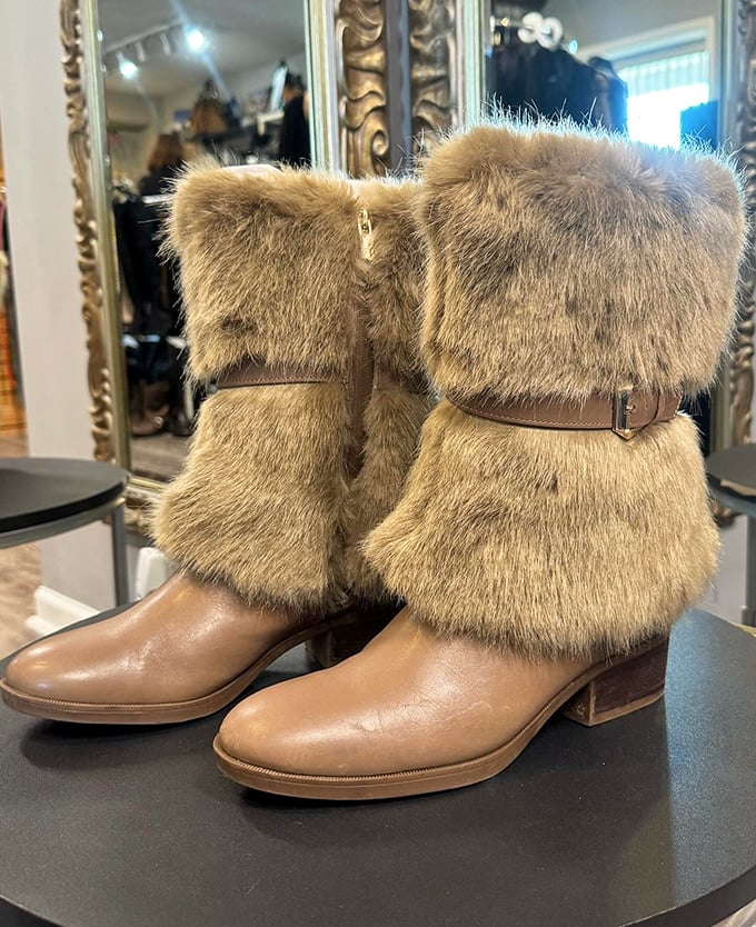 These fur-trimmed leather boots aren't just footwear&mdash;they're conversation pieces waiting to elevate your winter wardrobe from mundane to magnificent.