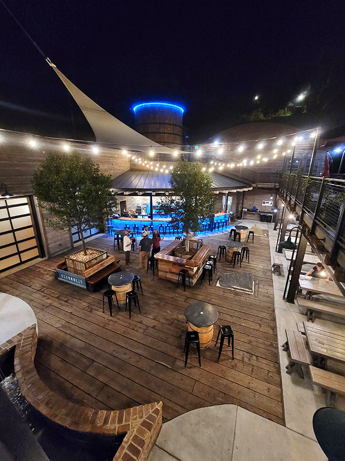 Evening transforms this outdoor dining space into a twinkling oasis, where string lights and good company make everything taste better.