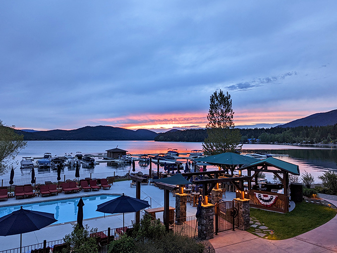 Sunset at The Lodge at Whitefish Lake&mdash;where "roughing it" means deciding between a lakeside cocktail or a dip in the infinity pool.