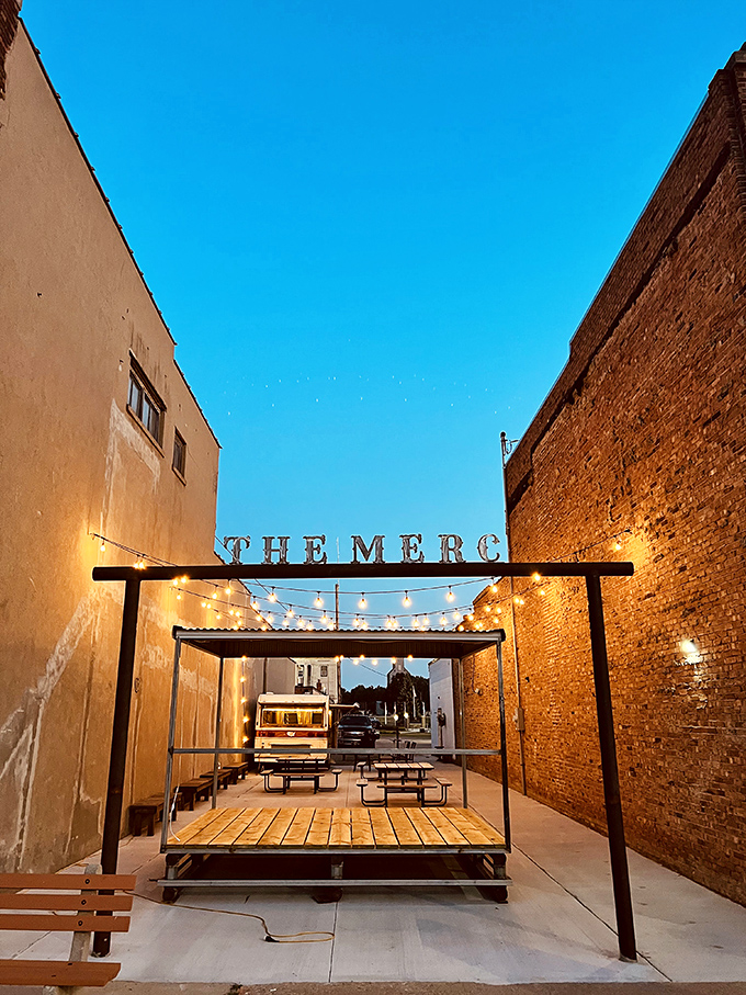 The Merc's string lights transform an ordinary alleyway into something magical, proving small towns understand ambiance too.
