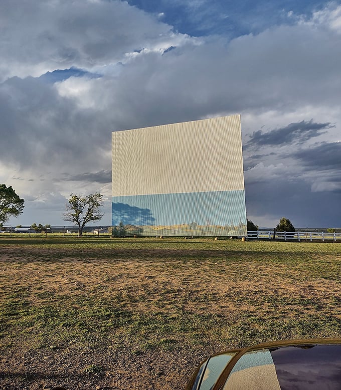 That distinctive white and blue screen has witnessed countless first dates, family outings, and summer memories under New Mexico's expansive skies.