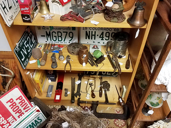 Vintage tools and license plates create a nostalgia cocktail stronger than anything Don Draper ever ordered at lunch.