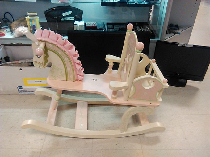 Not just a rocking horse&mdash;a pink princess carriage that's survived one child's royal phase and awaits its next monarch.