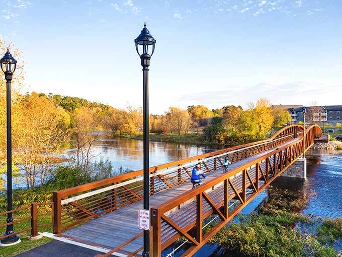 This pedestrian bridge isn't just functional&mdash;it's a front-row seat to nature's seasonal art show, especially magnificent during fall's golden transformation.