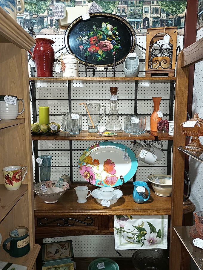 This vintage display could tell a thousand stories. That hand-painted floral tray probably served cocktails at parties where "I Love Lucy" was the talk of the evening.