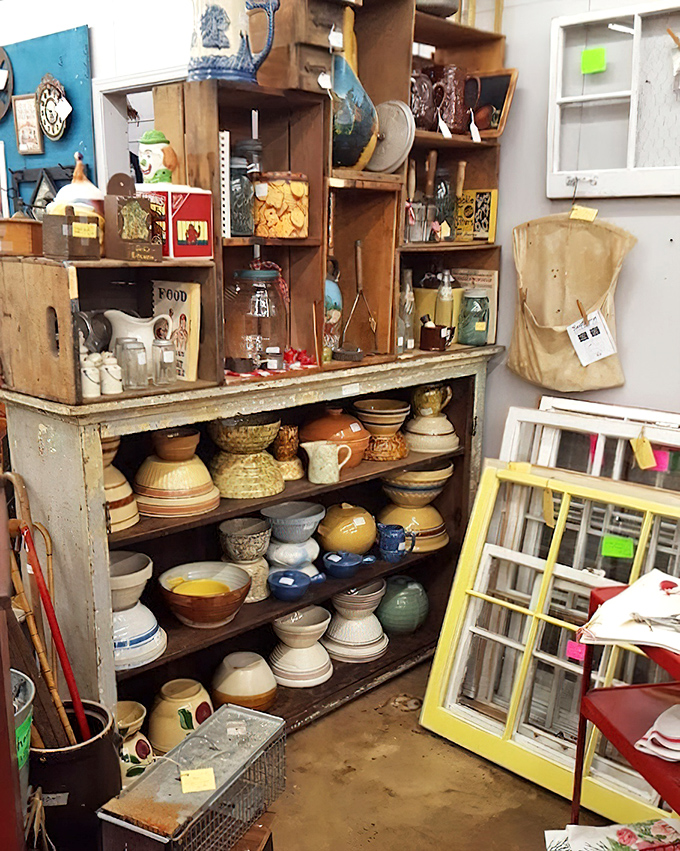 Vintage kitchenware meets rustic salvage in a delightful collision of eras that somehow makes perfect decorating sense.