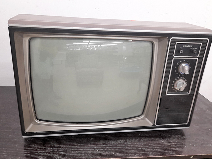 This vintage Zenith TV has seen more presidential addresses than most history professors. Just imagine the moon landing playing on this retro beauty!