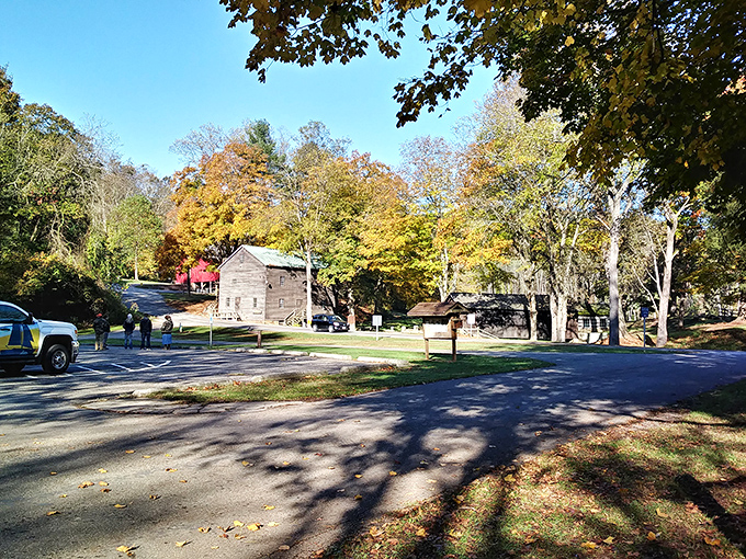 Pioneer Village whispers stories of yesteryear beneath autumn's golden canopy. History doesn't just live here&mdash;it throws open its doors and invites you in.