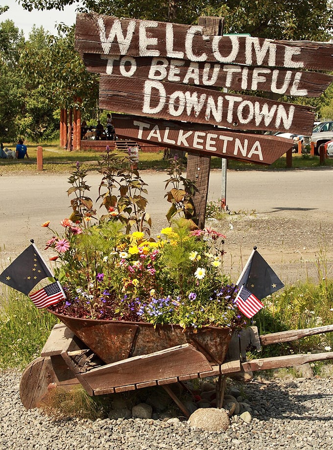 This welcome sign doesn't just greet visitors &ndash; it announces you've arrived somewhere that proudly embraces its quirky, flower-filled personality.