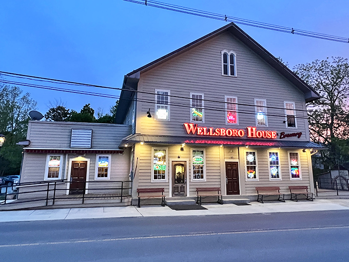 The Wellsboro House glows at twilight, beckoning weary travelers with the promise of craft brews and hearty meals&mdash;like a lighthouse for the hungry and thirsty.