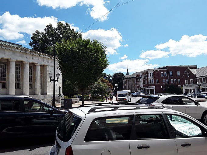 Westerly's downtown district bathes in golden afternoon light, creating that perfect small-town tableau Norman Rockwell would have sketched while enjoying an ice cream cone.