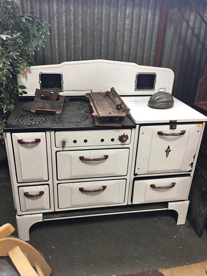 Grandma's kitchen comes roaring back to life in this gleaming white enamel stove. Just looking at it summons phantom smells of Sunday pot roasts.