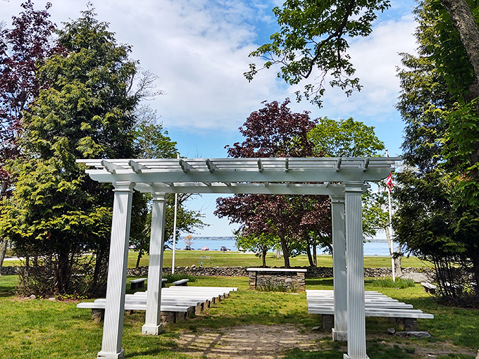Wedding dreams come true under this elegant white pergola. The bay view beyond promises picture-perfect memories for generations of Rhode Islanders.