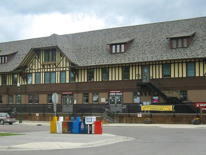The historic Whitefish Depot stands as a Tudor-style testament to the town's railroad roots, welcoming travelers just as it has for nearly a century.
