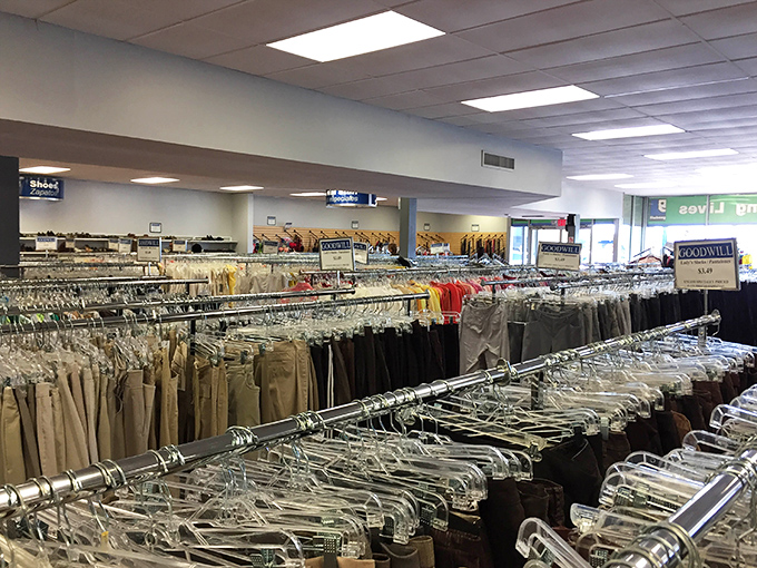 Racks upon racks of possibility! The men's section is organized with military precision that would make Marie Kondo salute.