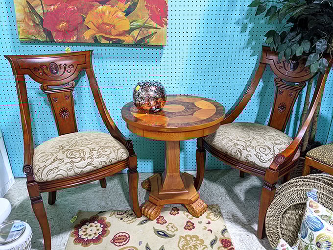 Elegance from another era&mdash;these carved wooden chairs and inlaid table whisper tales of dinner parties past. Antique furniture that outclasses anything from big box stores.