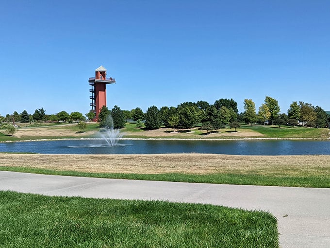 Yanney Heritage Park's distinctive tower stands watch over peaceful waters where fountains dance and stress simply evaporates into thin air.
