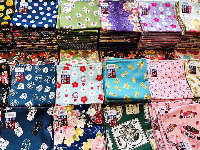 These aren't your average bandanas. Each square of Japanese fabric tells a story, from cherry blossoms to lucky cats, waiting to become your next conversation piece.