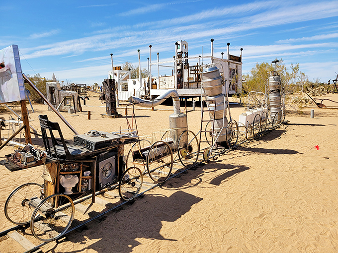 A mechanical menagerie on wheels! This bicycle-topped structure proves that in the desert, even transportation becomes a meditation on movement and stasis.