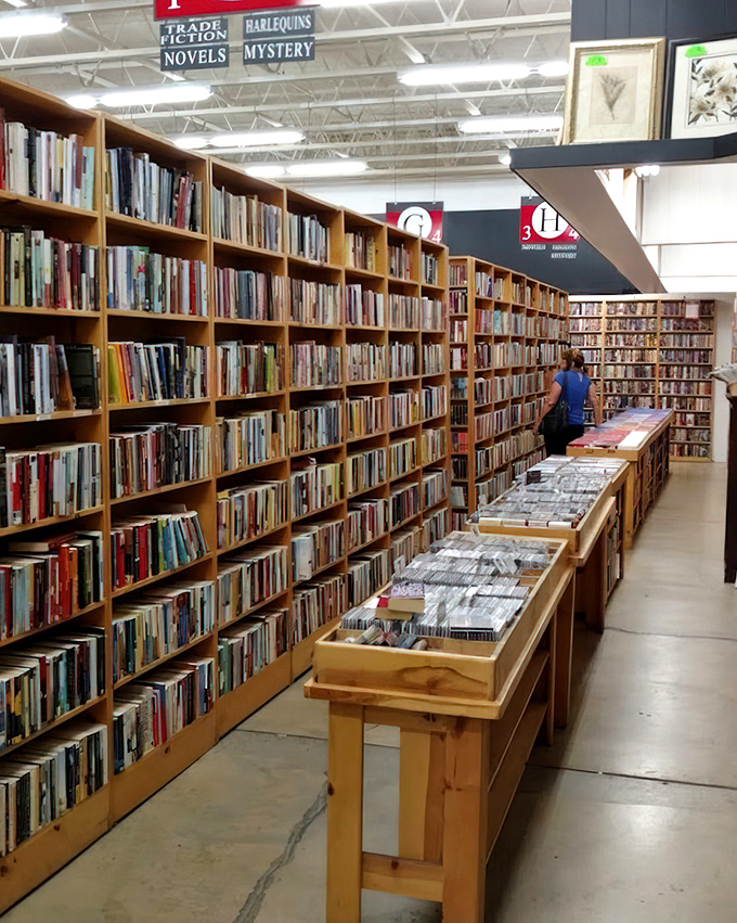 Bibliophile heaven! Row after glorious row of pre-loved books, organized with a precision that would make librarians weep with joy.