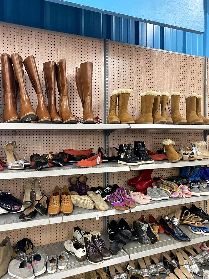 The footwear section: where barely-worn UGGs and leather boots await their second chance at island life. Someone's retail regret becomes your fashion jackpot.