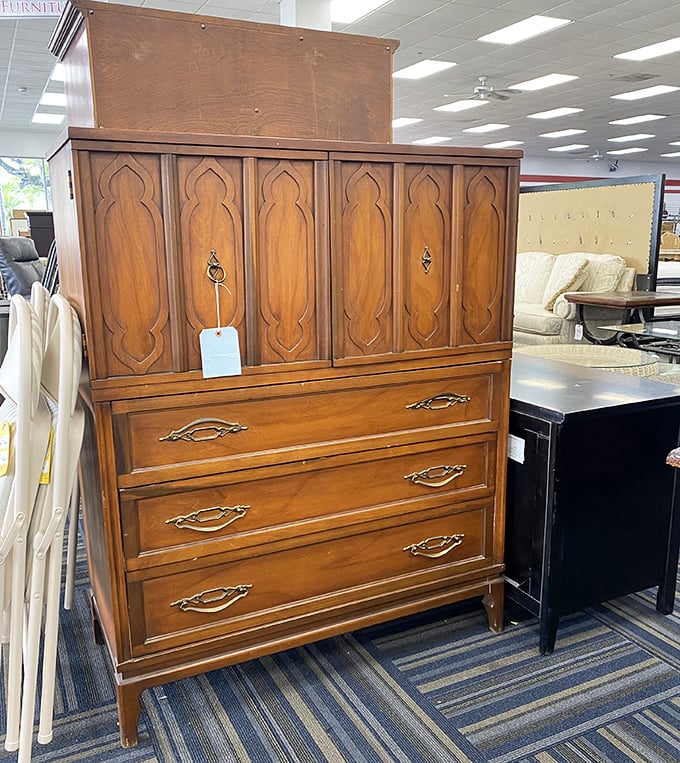 This mid-century wooden dresser with distinctive carved panels isn't just furniture&mdash;it's a conversation piece waiting for its second act.