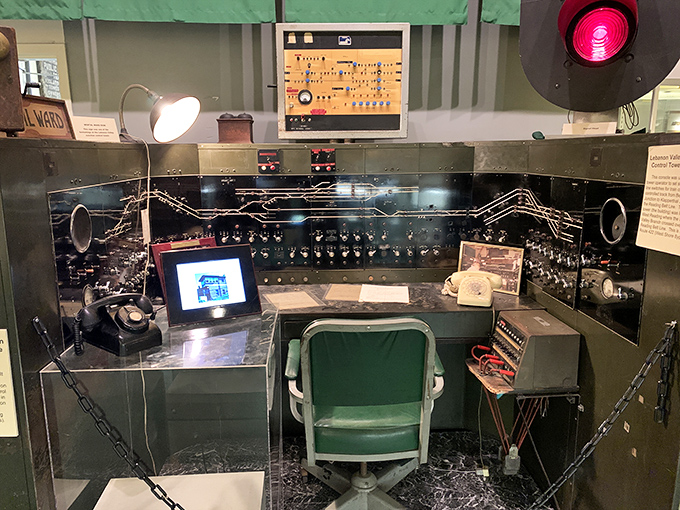 Step into a railroad dispatcher's world at this meticulously preserved control panel, where the fate of countless trains once rested.