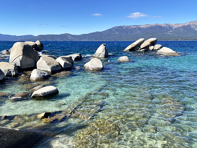 Water so clear you could read yesterday's newspaper through it. These granite boulders have been perfecting their poses for millennia.