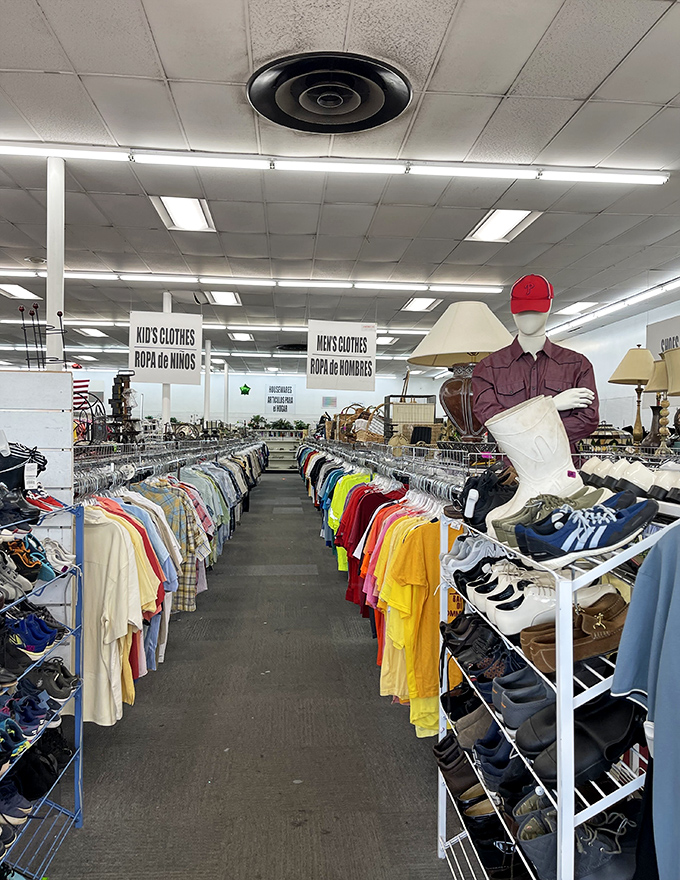 Men's clothing arranged by color creates a thrifter's rainbow. That burgundy shirt might be your next lucky find!