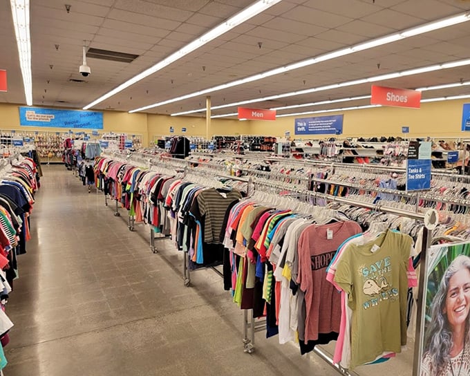 The clothing racks stretch toward infinity like a textile galaxy, each hanger a potential fashion revelation waiting to be discovered.