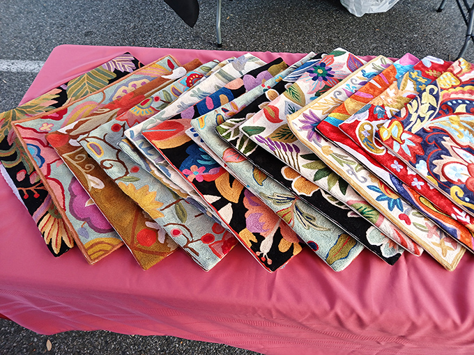 Textile heaven! These vibrant embroidered fabrics tell stories from around the world while waiting to transform your boring couch pillows.