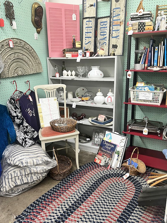 A perfectly curated booth where vintage textiles meet delicate porcelain. That braided rug has probably witnessed more family gatherings than your Thanksgiving table!